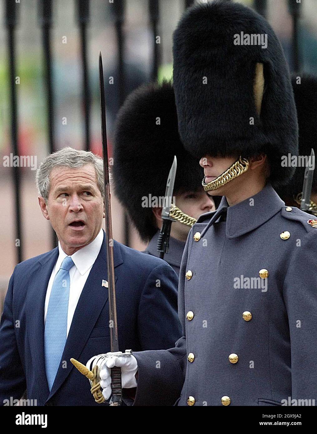 U.S. President George W. Bush inspects an honour guard at Buckingham ...
