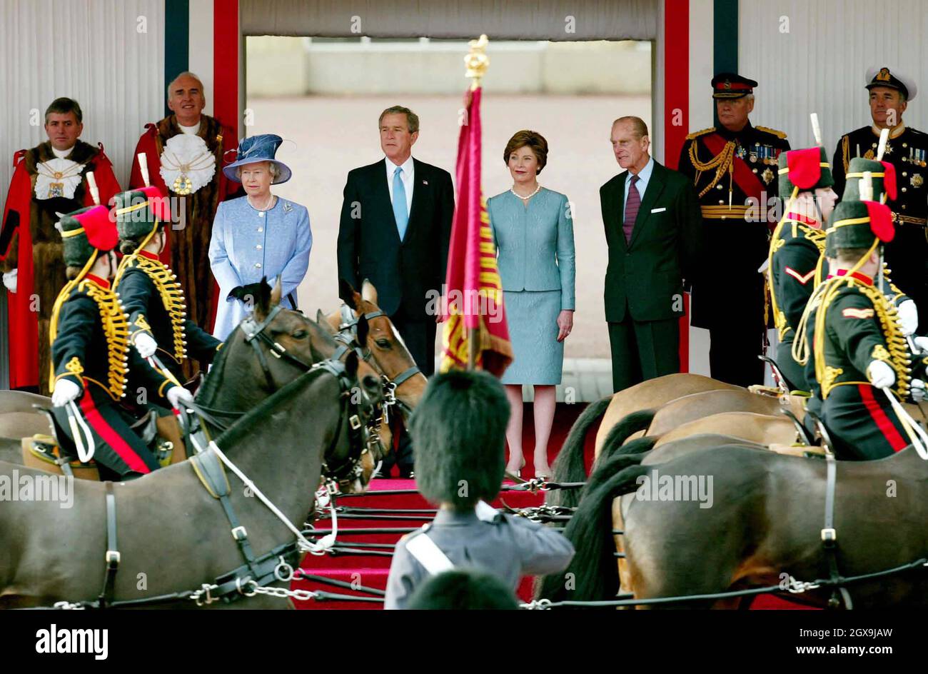 U.S. President George W. Bush (centre 2L) and his wife Laura (centre 2R ...