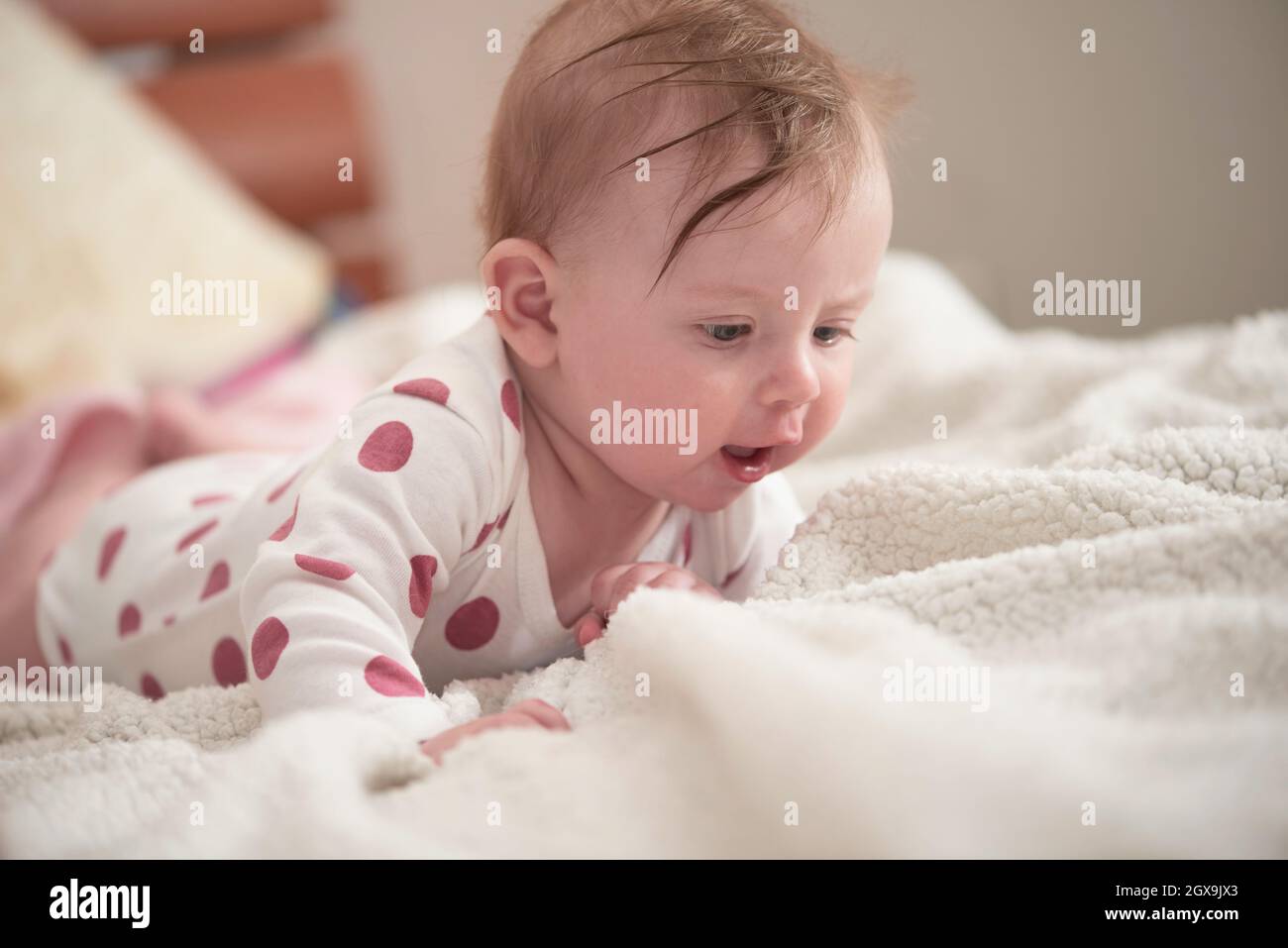 cute little baby playing with hand and smiling with no teeth funny ...