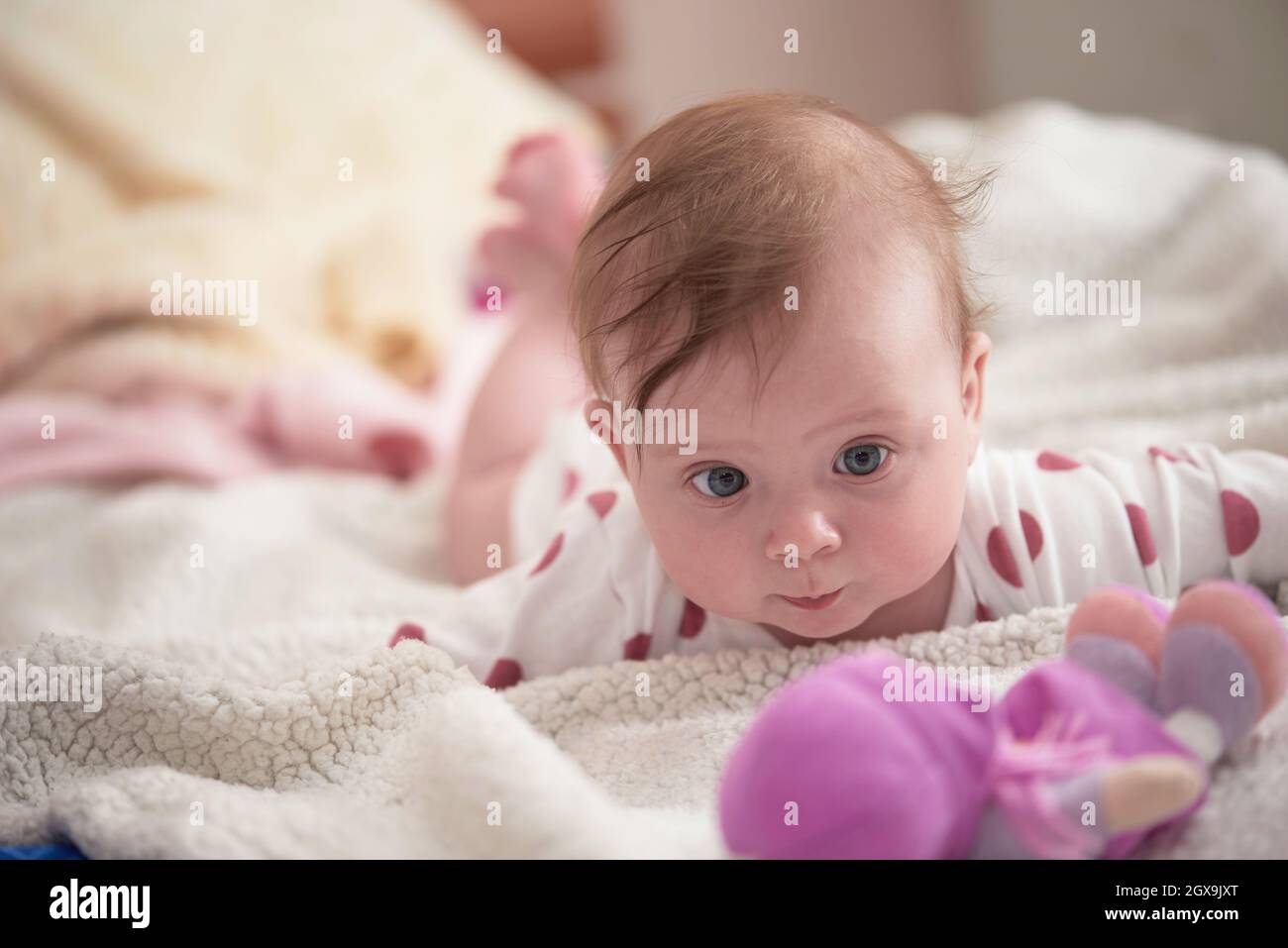 cute little baby playing with hand and smiling with no teeth funny ...