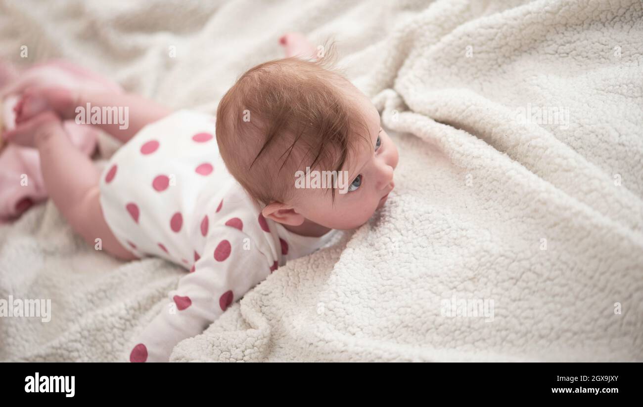 cute little baby playing with hand and smiling with no teeth funny ...