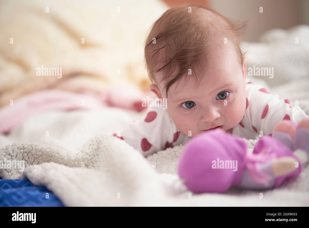 cute little baby playing with hand and smiling with no teeth funny ...