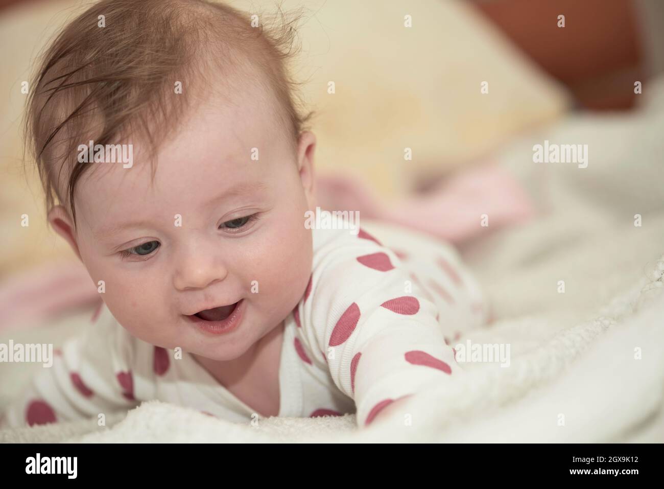 cute little baby playing with hand and smiling with no teeth funny ...