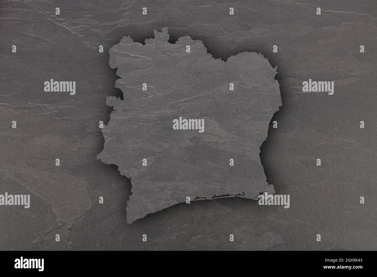 Map of Ivory Coast on dark slate Stock Photo - Alamy