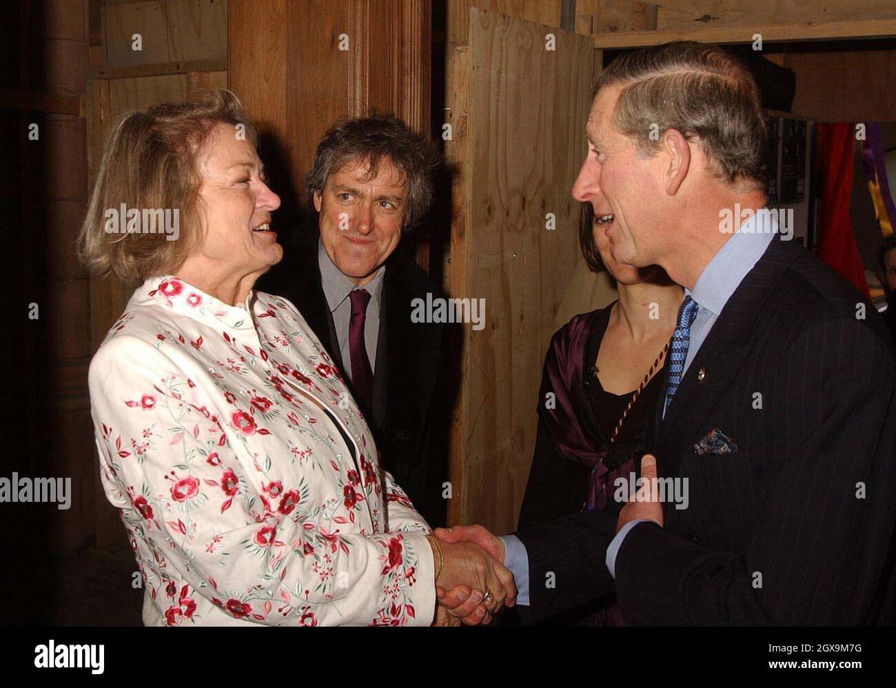 The Prince of Wales talks to children during a visit to Haggerston ...