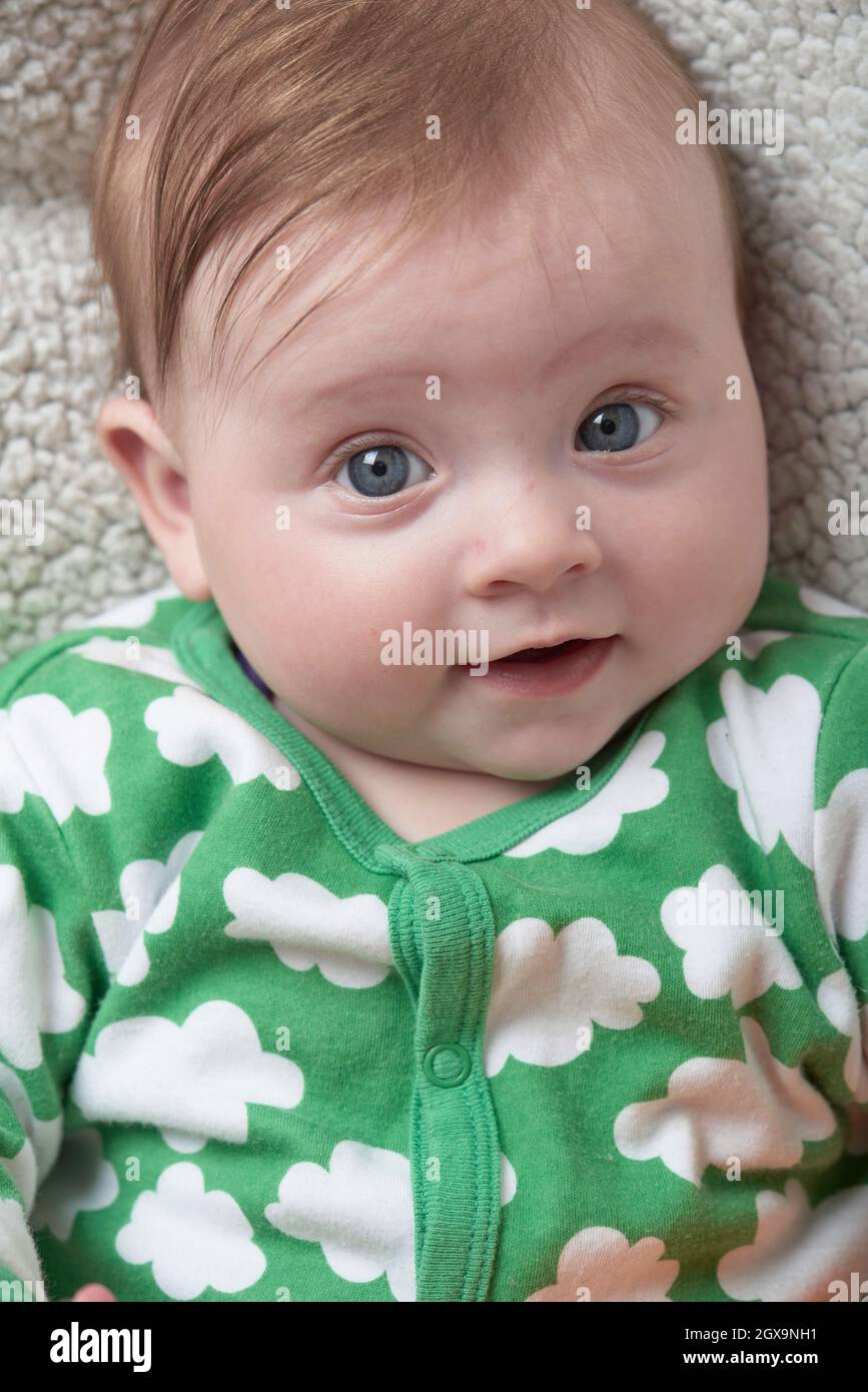 cute little baby playing with hand and smiling with no teeth funny ...