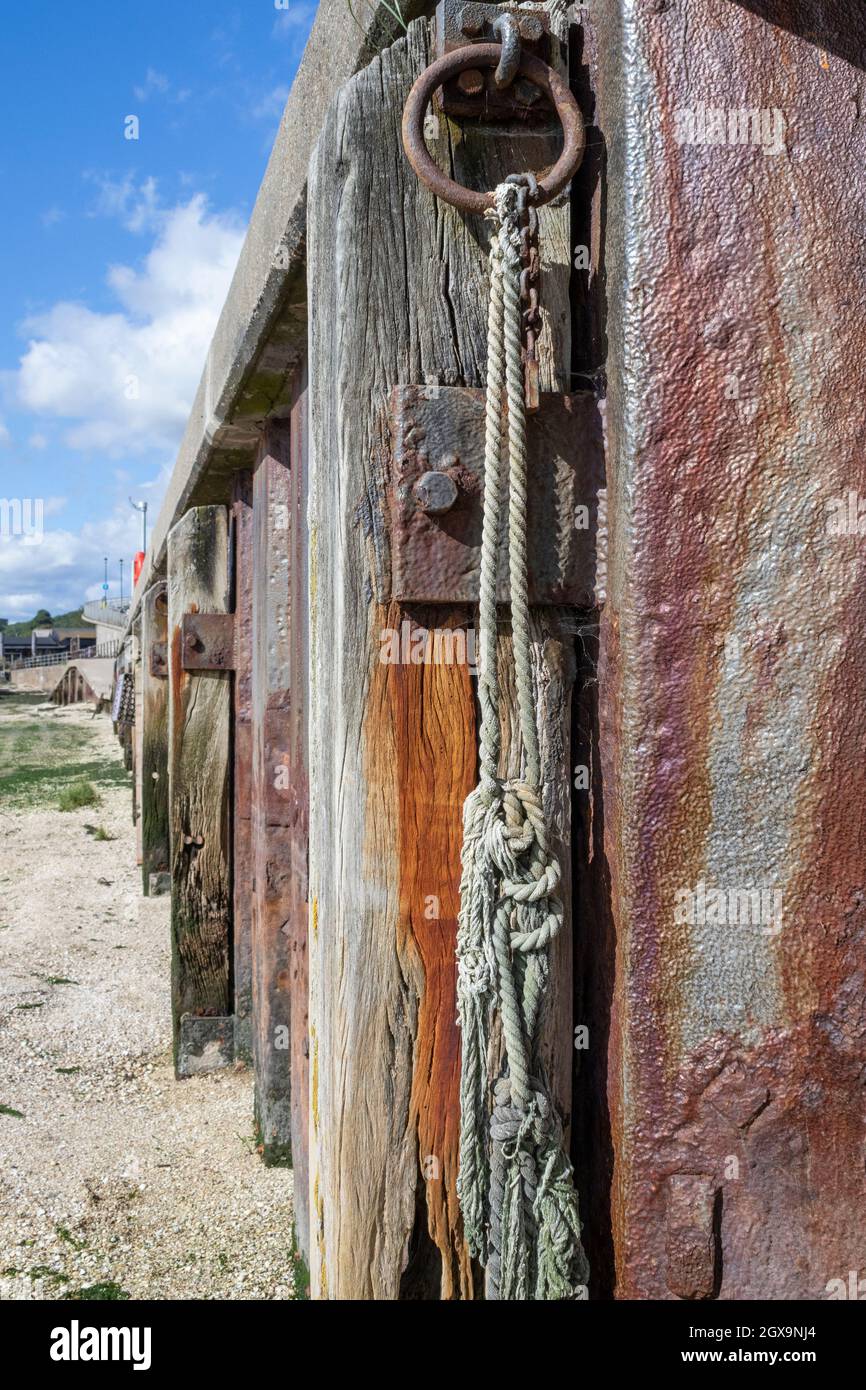 Old nautical rope hanging from a weathered wooden post at Old Leigh ...