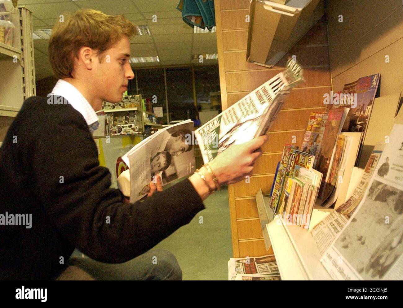 Prince William browses through the magazine rack in the Good News ...