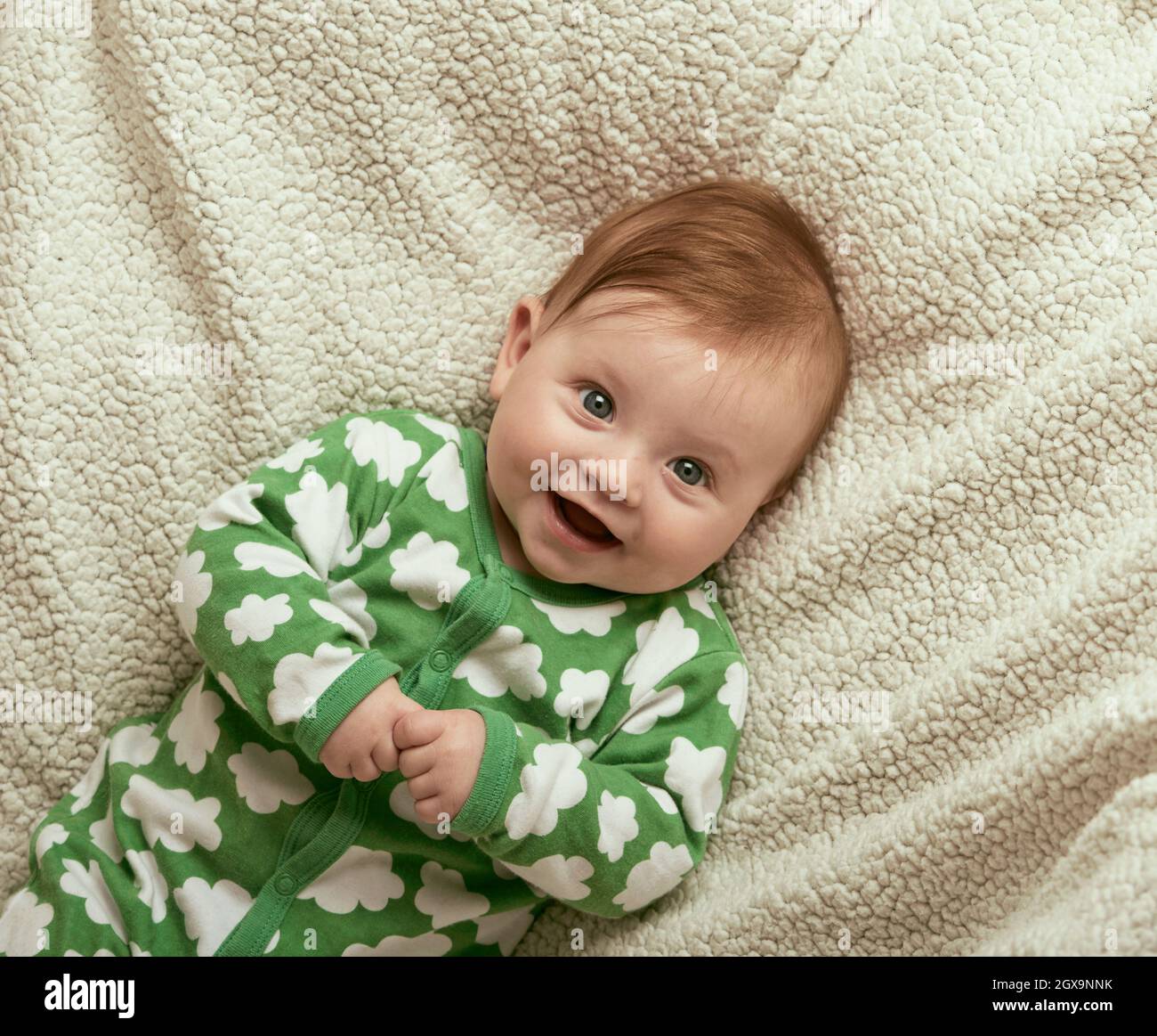 cute little baby playing with hand and smiling with no teeth funny ...