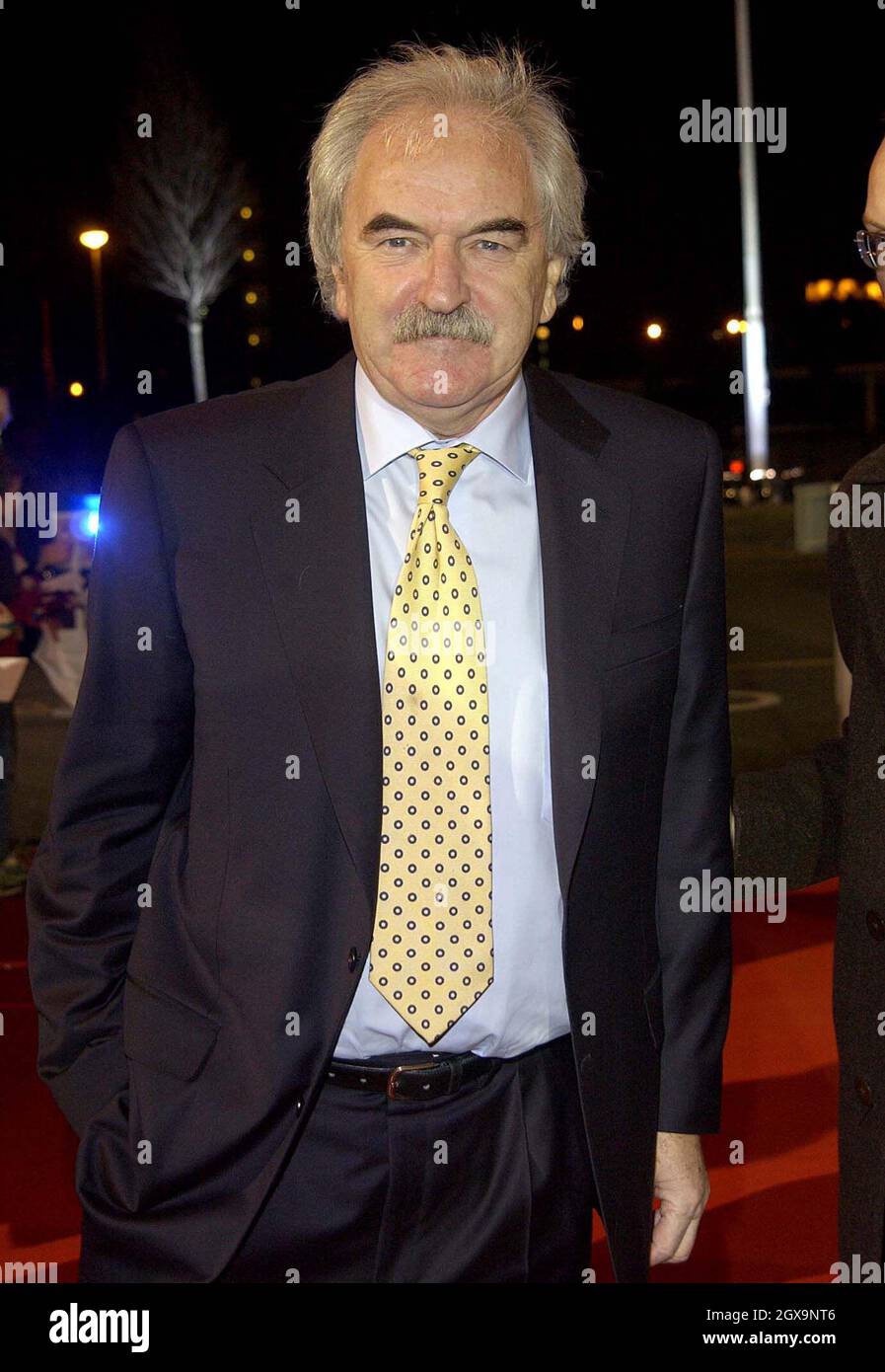 Des Lynam arrives for the BBC Sports Personality of the Year 2003 held ...