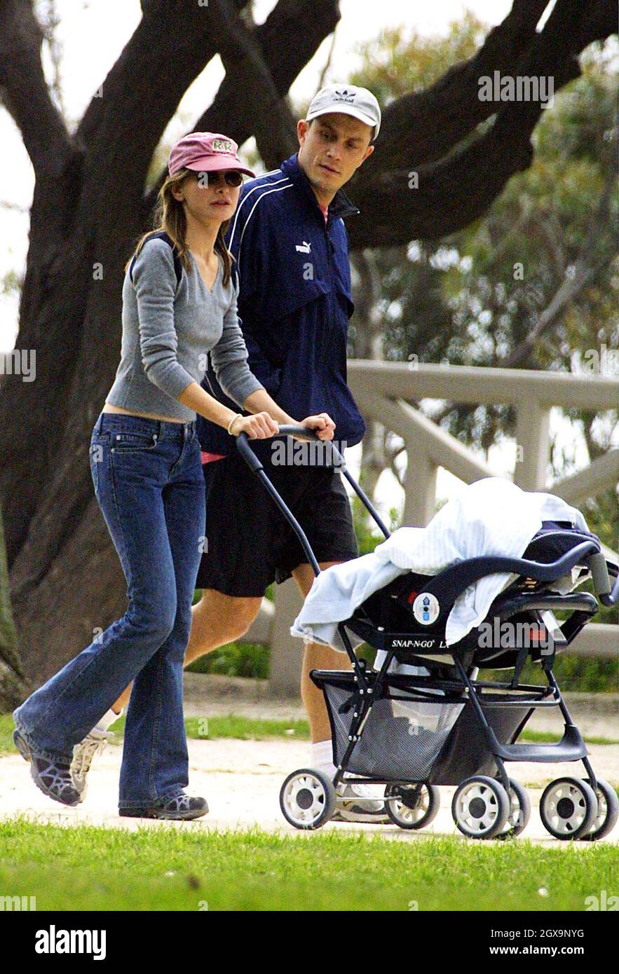 Calista Flockhart pushes her newly purchased baby with her bodyguard in ...