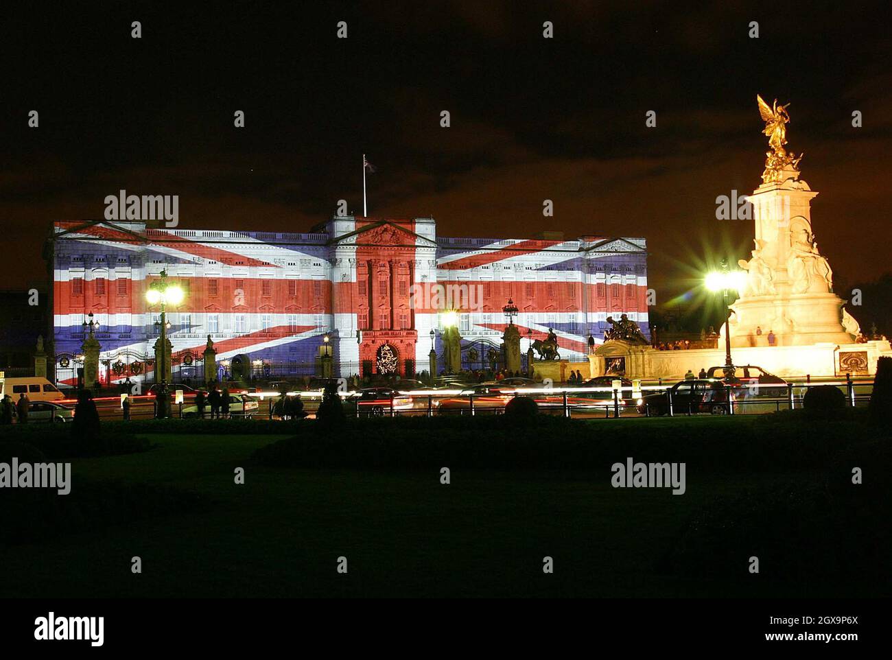 Buckingham Palace is lit up as the culmination of the Brighten Up ...