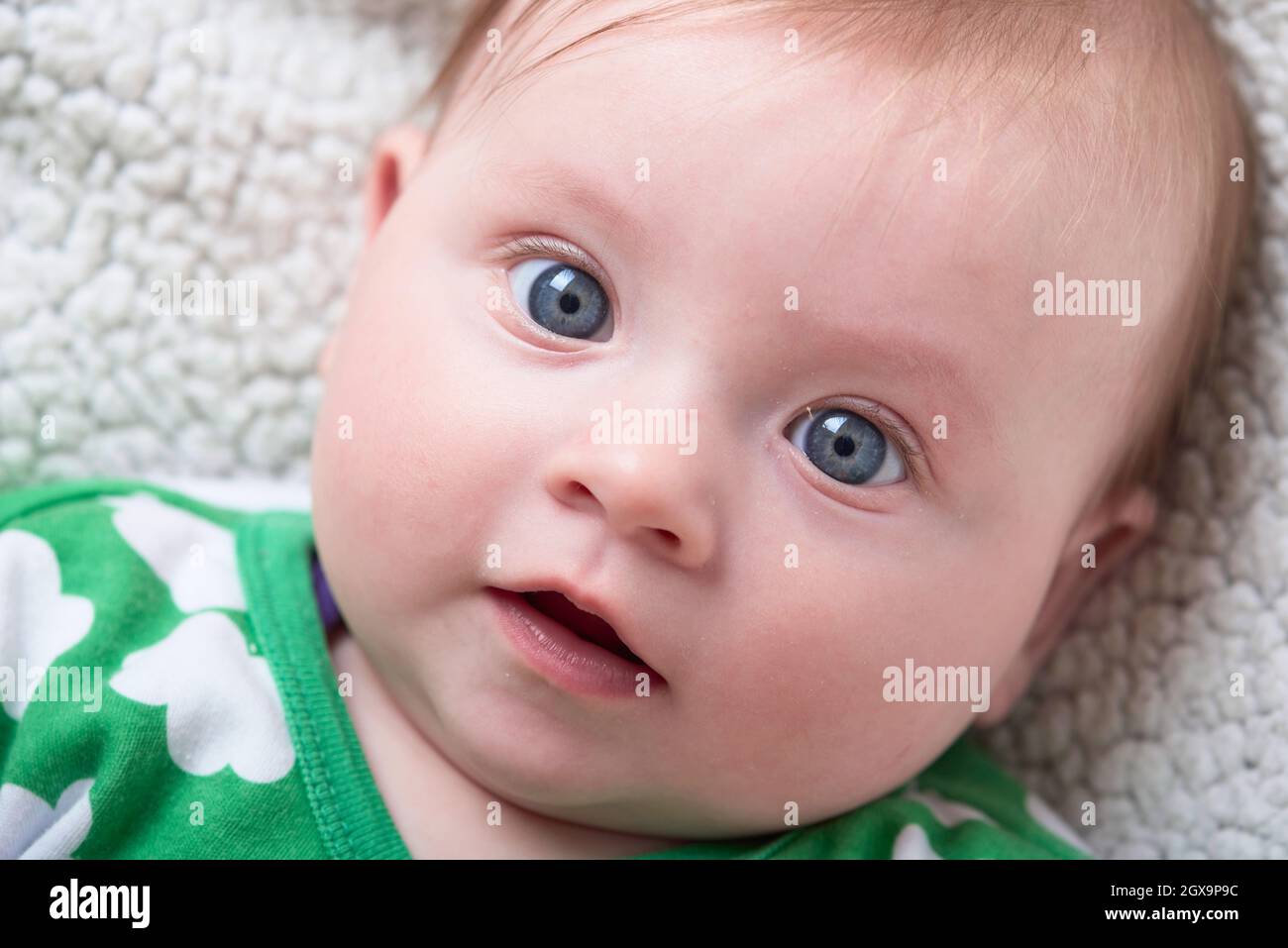 cute little baby playing with hand and smiling with no teeth funny ...