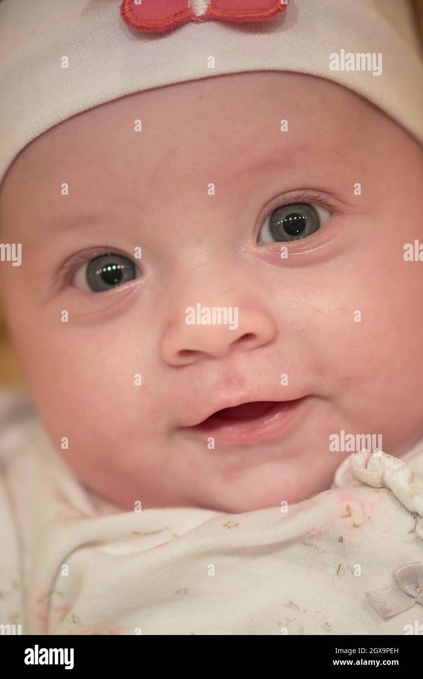 portrait happy cute newborn little baby smilling at home Stock Photo ...