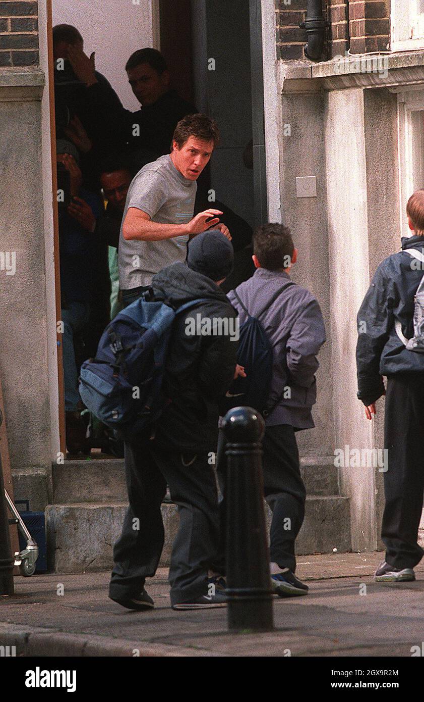 1HUGH GRANT FILMING 'ABOUT A BOY' AT CLERKENWELL GREEN IN LONDON. THE ...