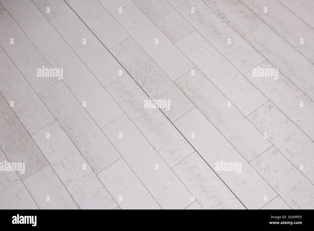 Ceramic wood effect tiles and tools for tiler on the floor unfinished ...