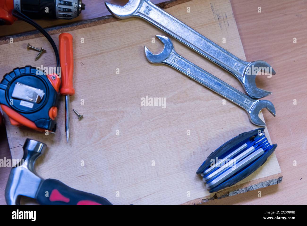 set of hand working tools on wooden background The concept of tools and ...