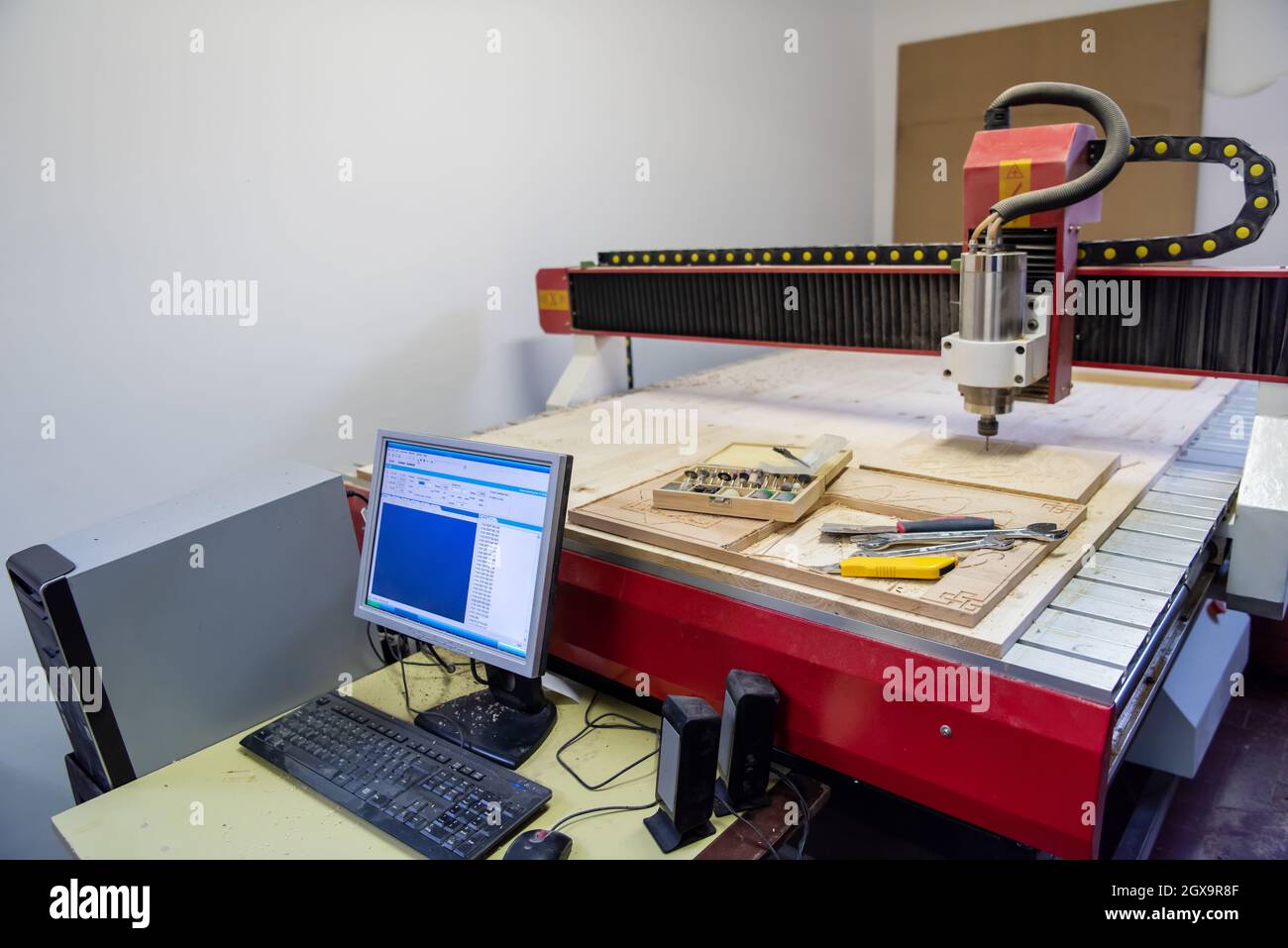 wood milling on modern automatic woodworking machine with CNC ...