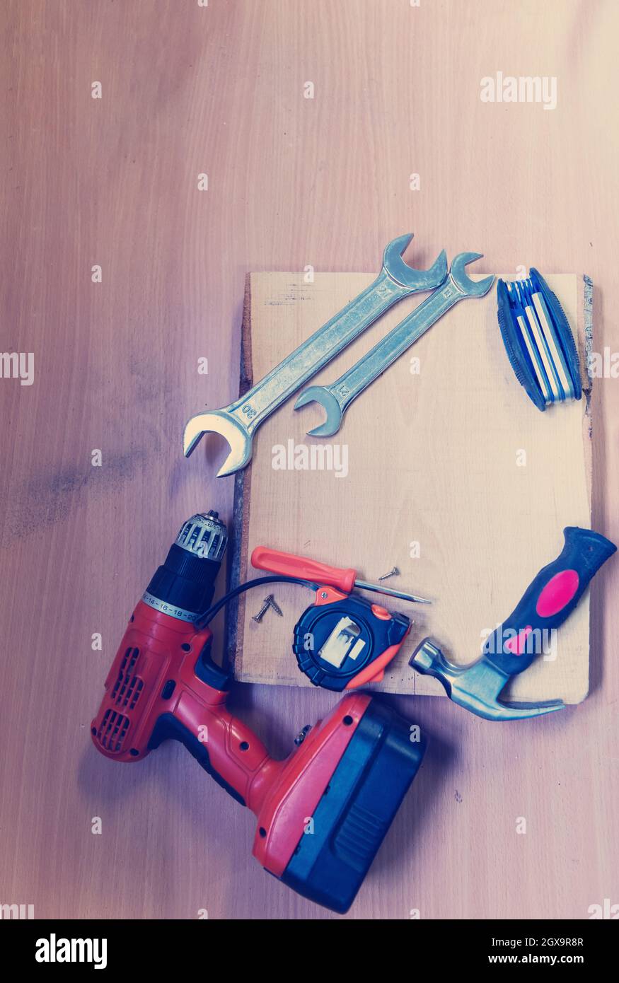 set of hand working tools on wooden background The concept of tools and ...