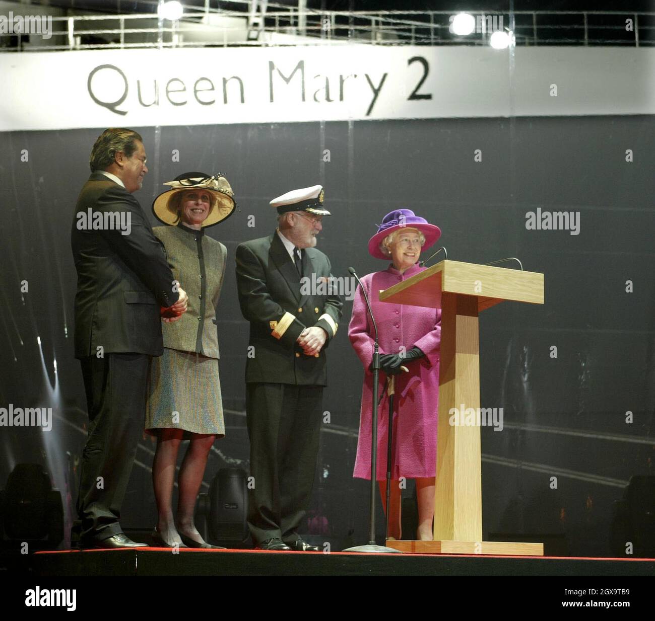 The Queen with Cmdr Ronald Warwick and Cunard President Pamela Conover ...