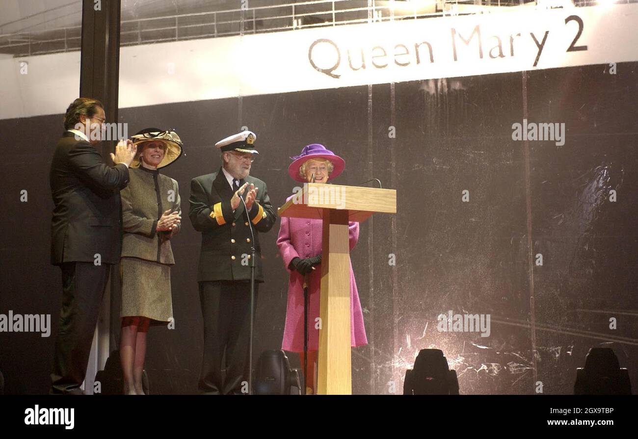 The Queen with Cmdr Ronald Warwick and Cunard President Pamela Conover ...