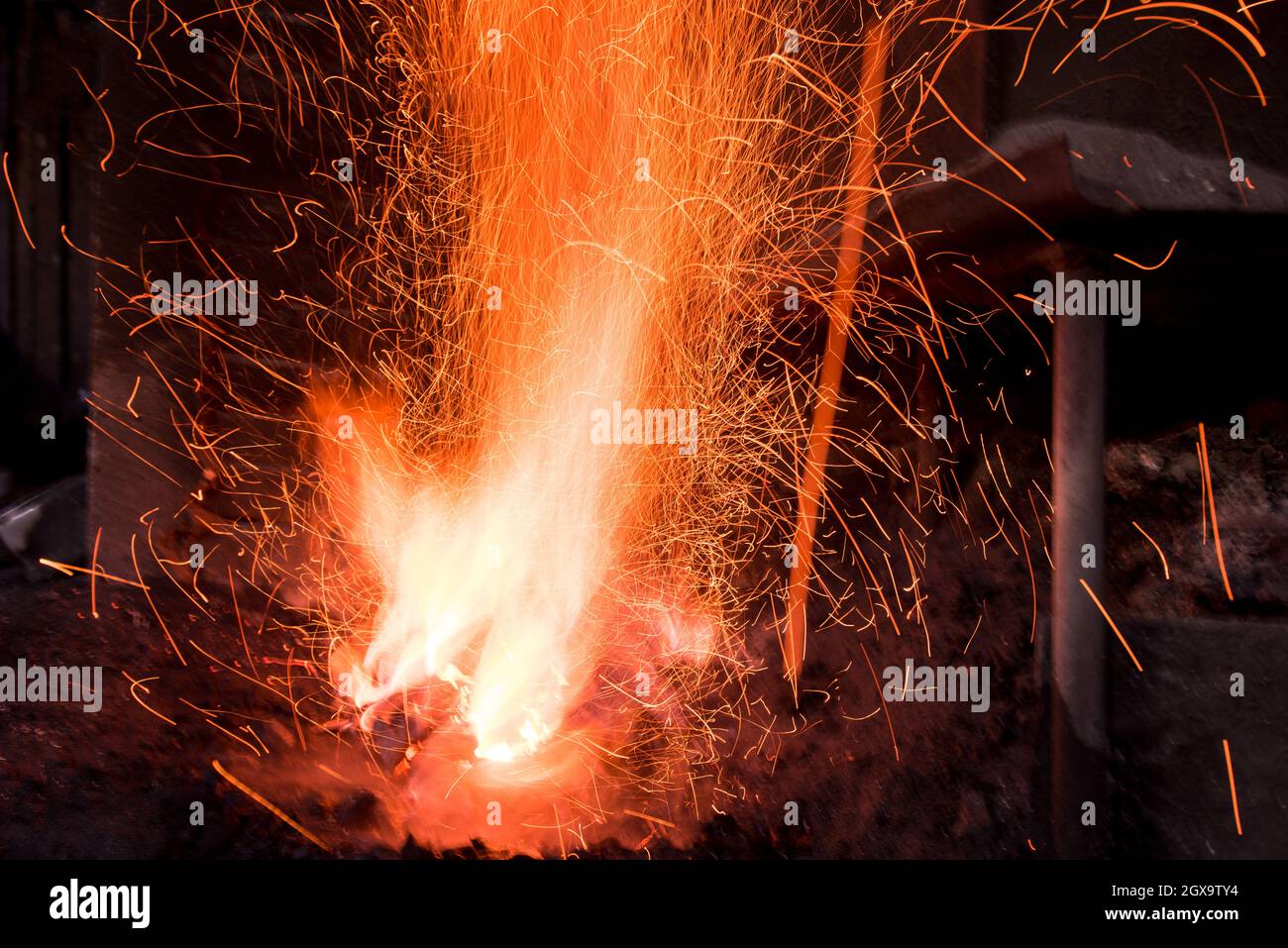Traditional blacksmith furnace with burning fire Burning fire in ...