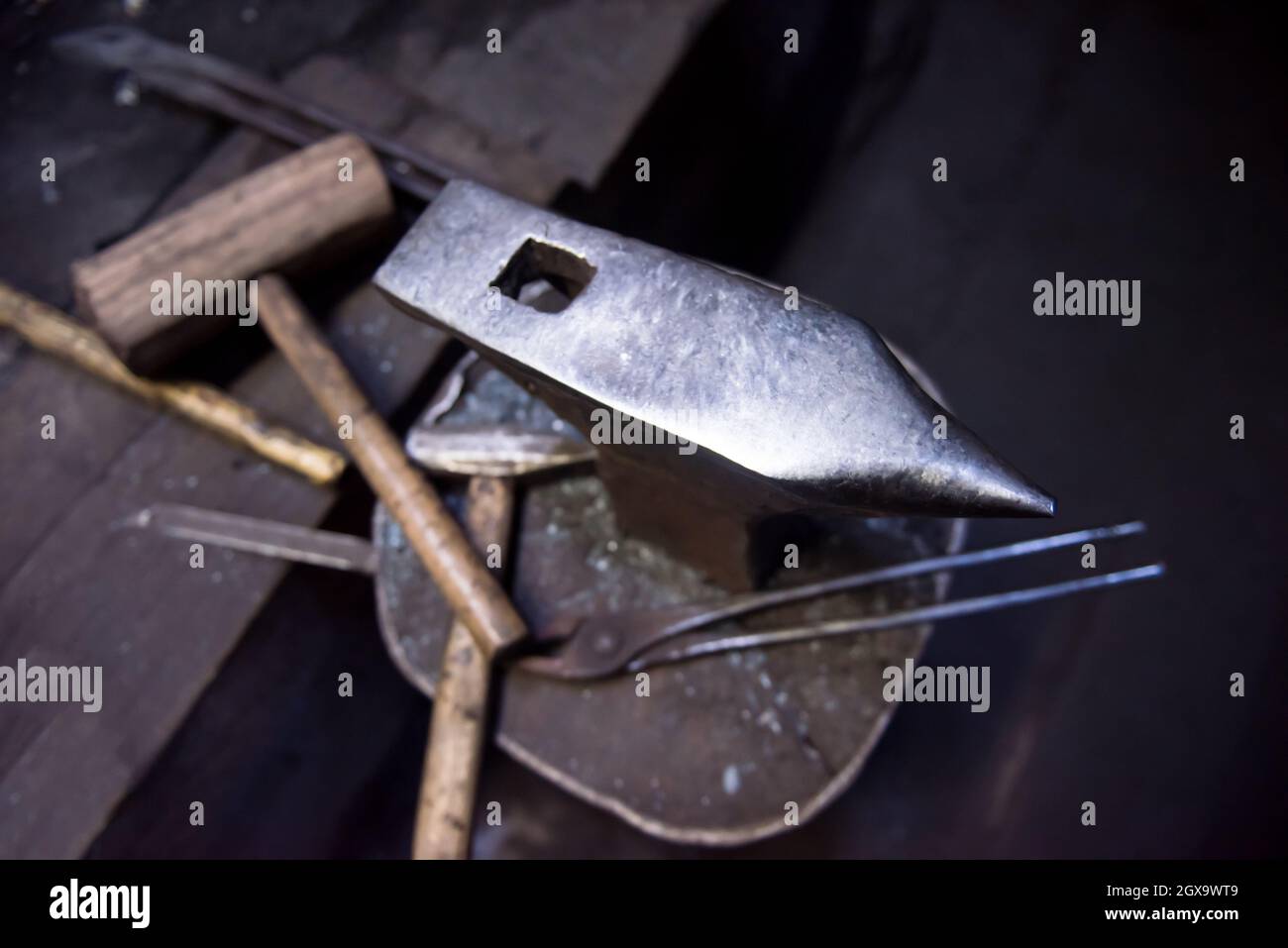 Working tool forge consisting of the anvil, hammer and tongs at ...