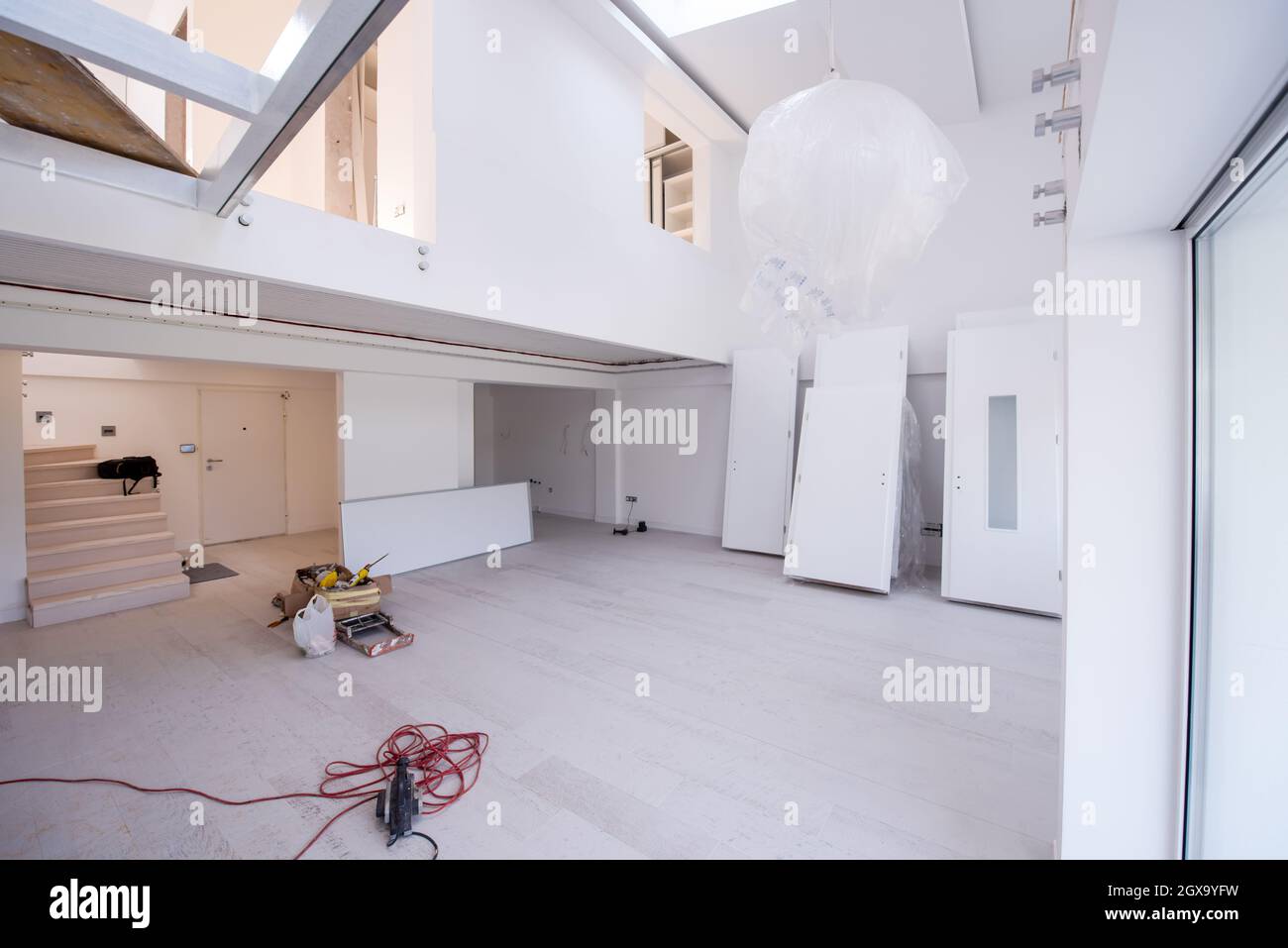Interior doors stacked in a new apartment waiting for installation ...