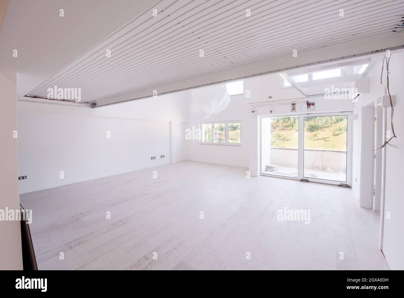 Interior of empty stylish modern open space two level apartment with ...