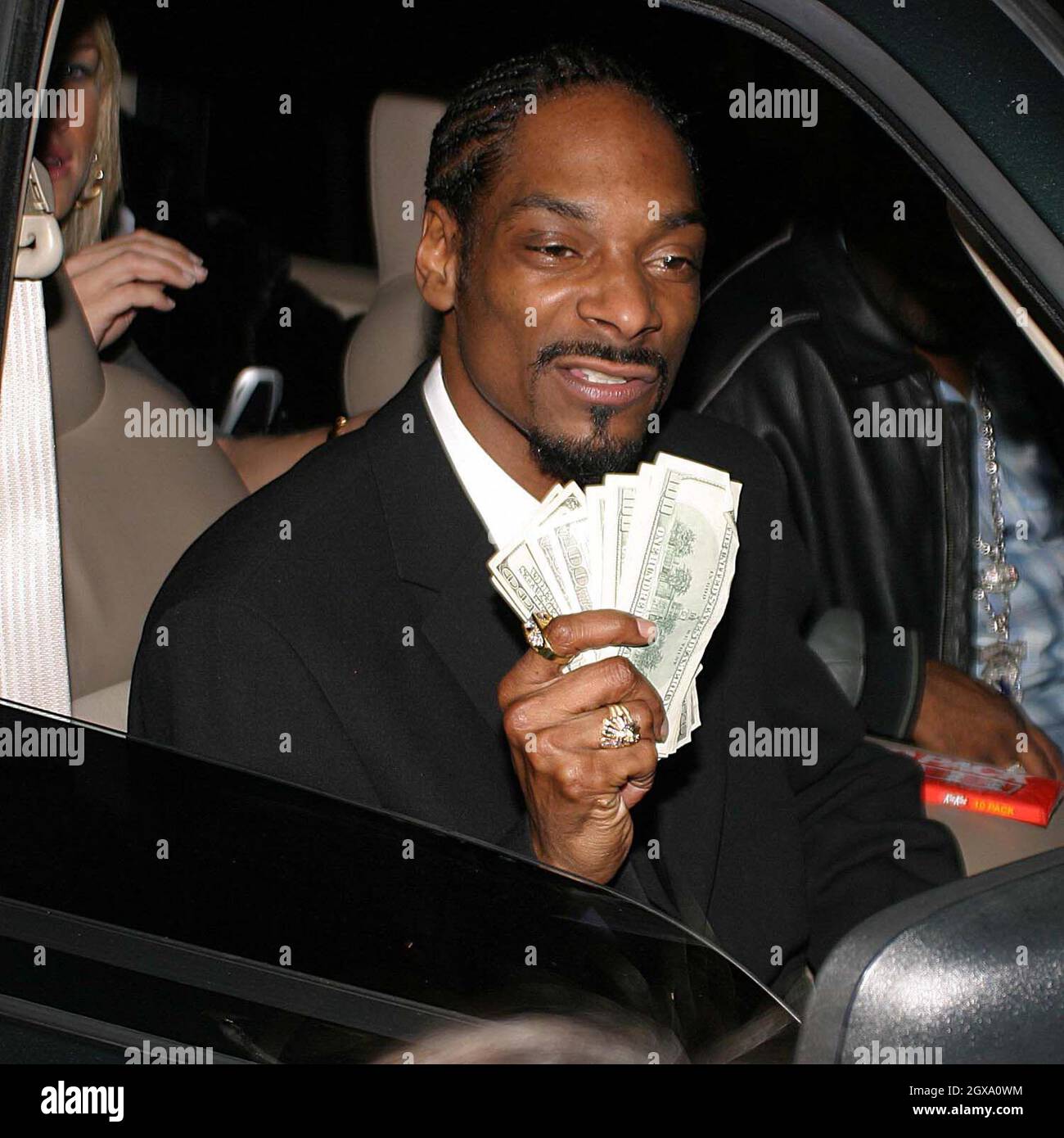 Snoop Dog shows his Ladies his Bling in New York Stock Photo - Alamy