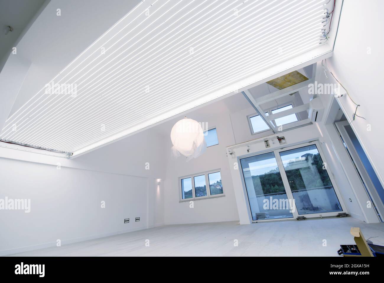 Interior of empty stylish modern open space two level apartment with ...