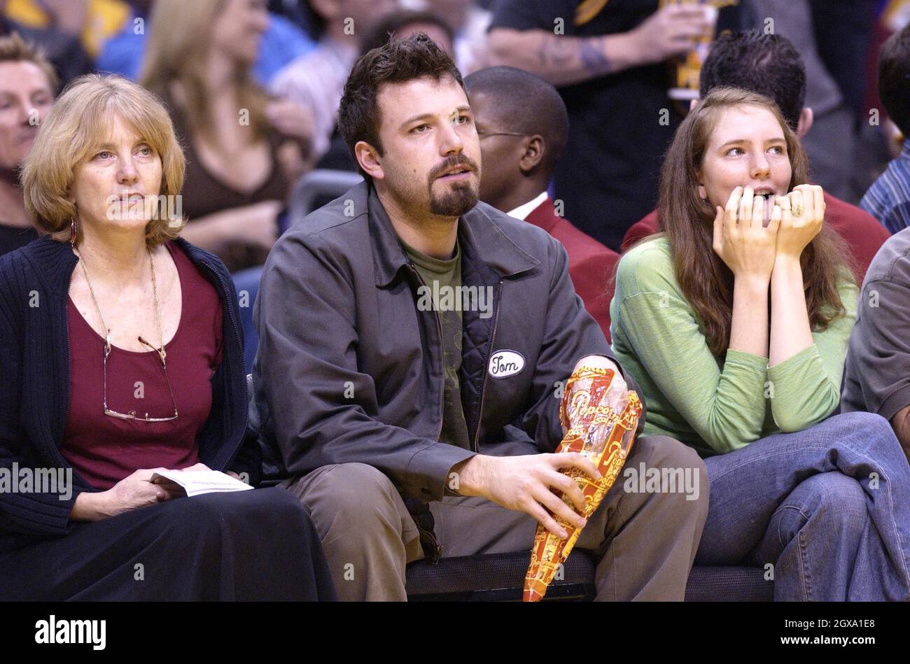 Actor Ben Affleck (C) attends the Los Angeles Lakers/Portland Trail ...