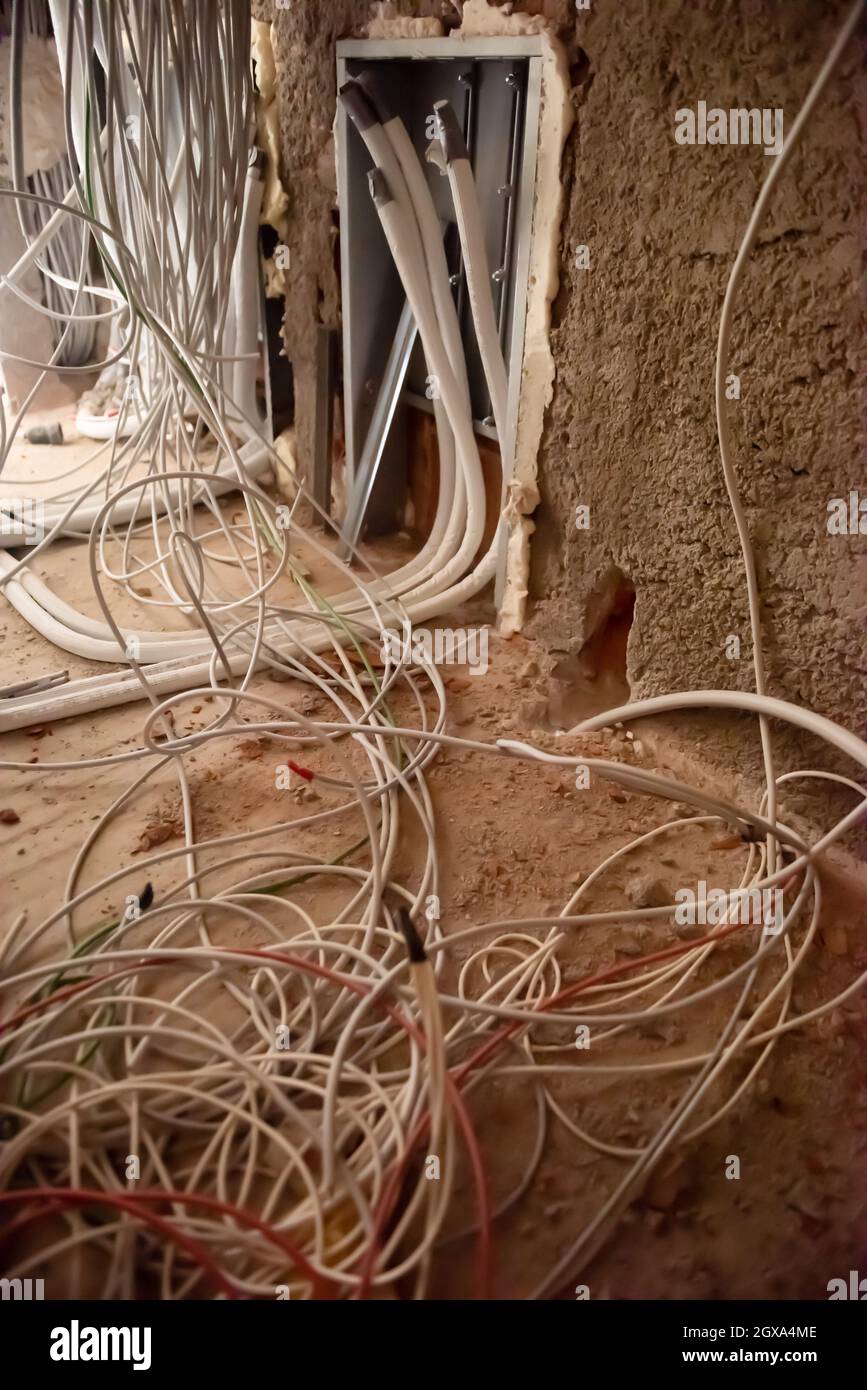 Socket back boxes with wires in a wall. Cabling background. electrical ...