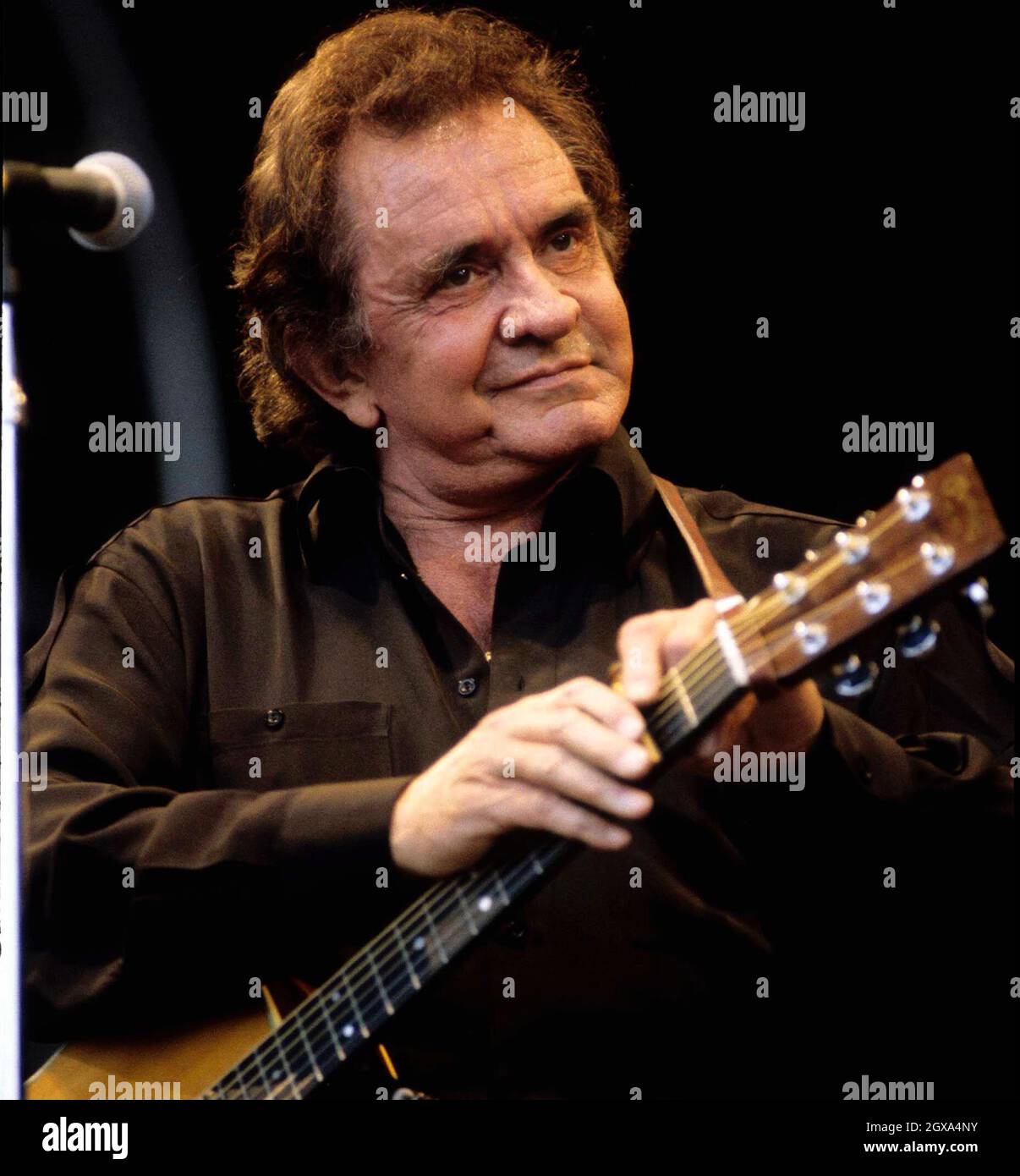 Country singer Johnny Cash performing live at the 1994 Glastonbury ...