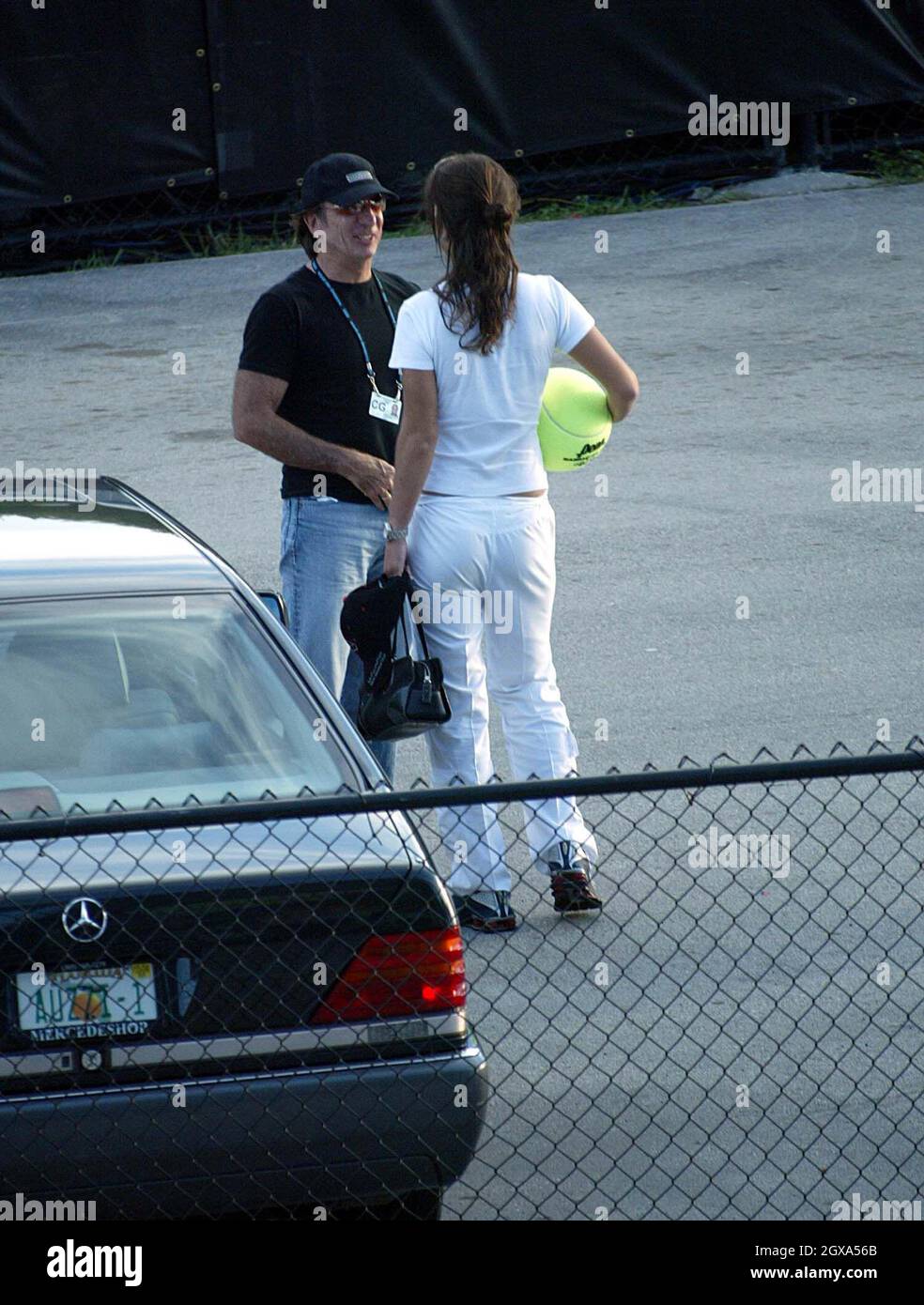 Emerson Fittipaldi with his third wife at the NASDQ Tennis Tournament ...