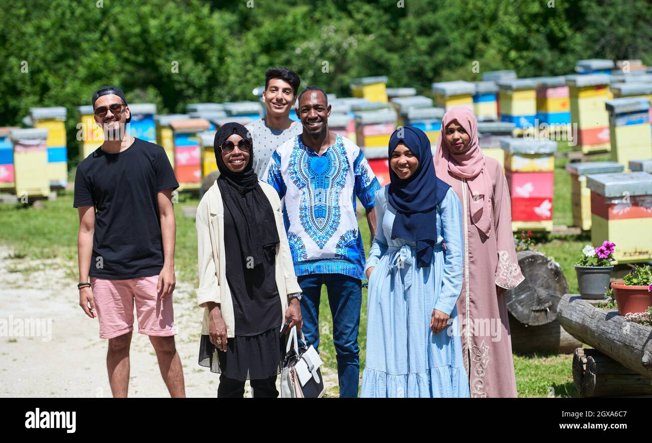 african muslim people group visiting local honey production farm Stock ...