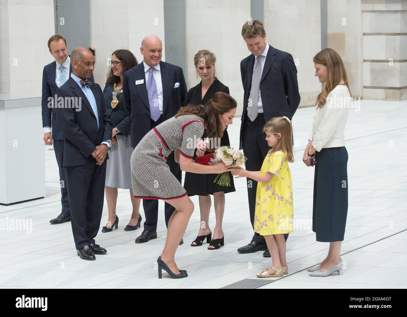 The Duchess of Cambridgereceives a bouquet of flowers from Lydia Hunt ...