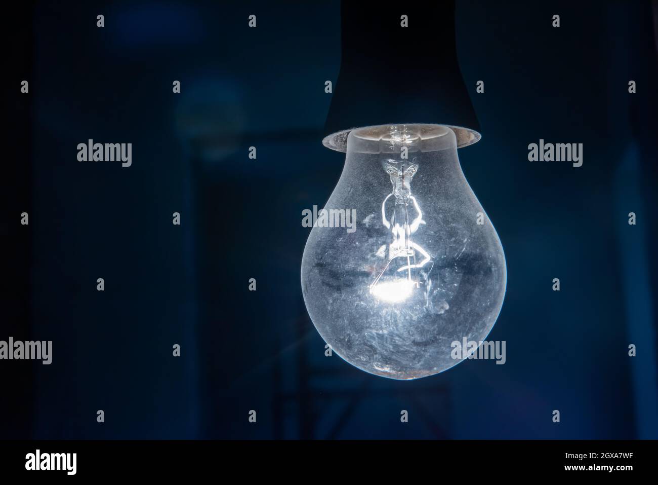 Electric lighting bulb on the dark background Stock Photo - Alamy