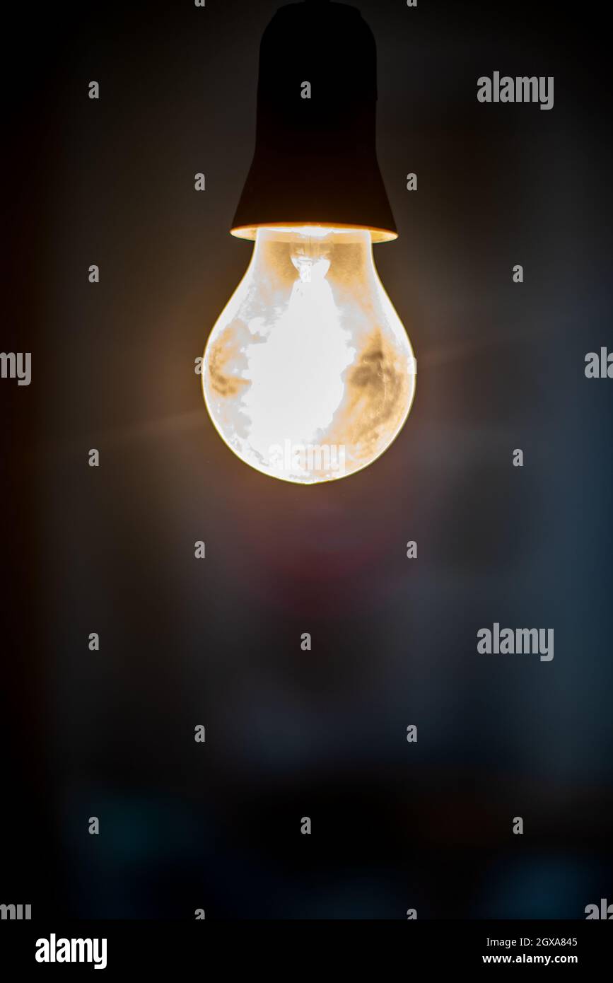 Electric lighting bulb on the dark background Stock Photo - Alamy