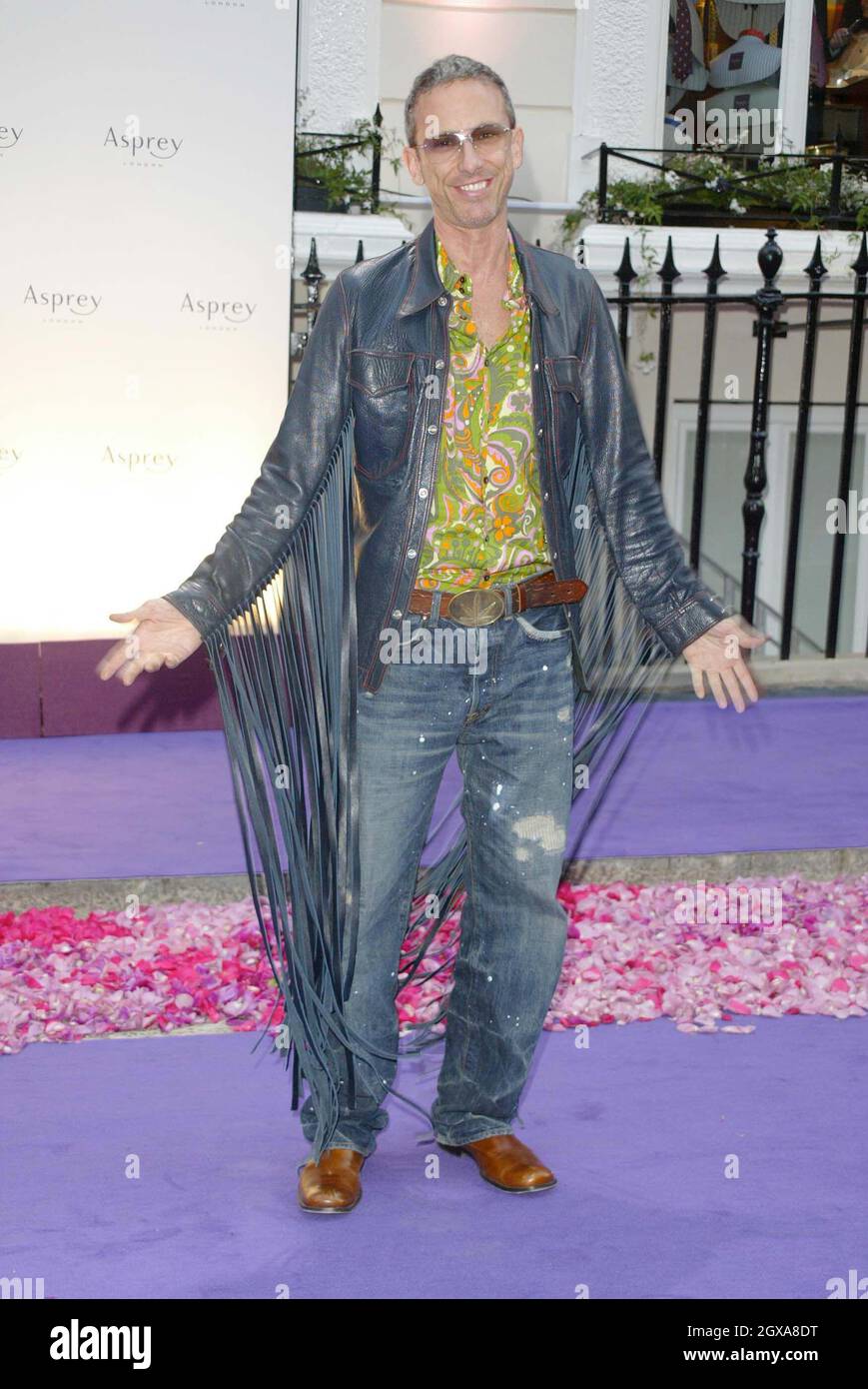 Patrick Cox, famed shoe designer arrived at the re-opening party of ...