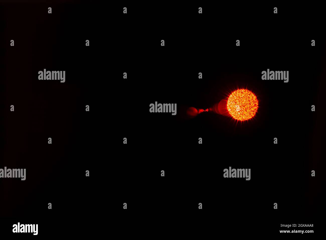 professional worker using laser level in a building under construction ...