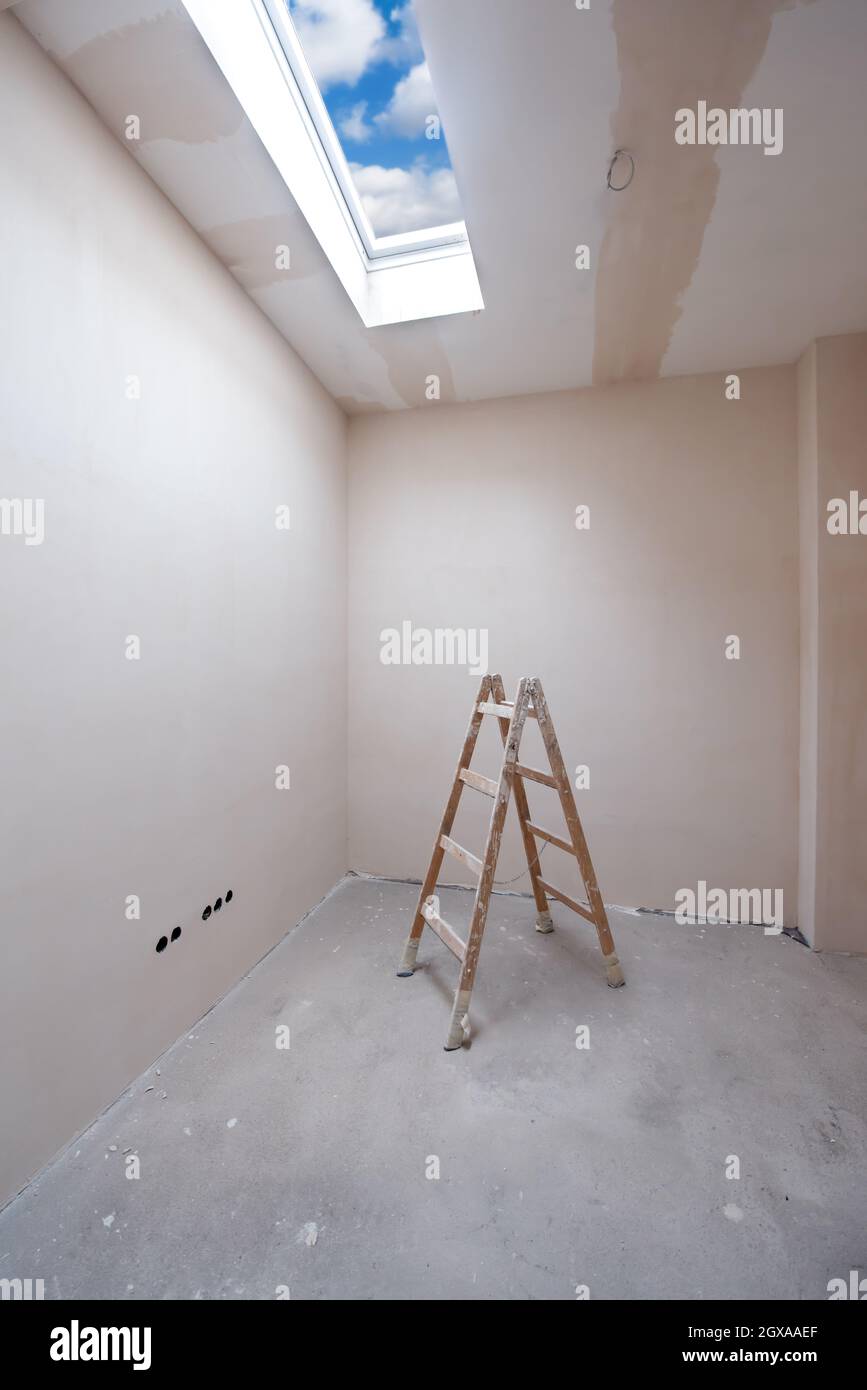 ladder in Interior of apartment during construction, remodeling ...