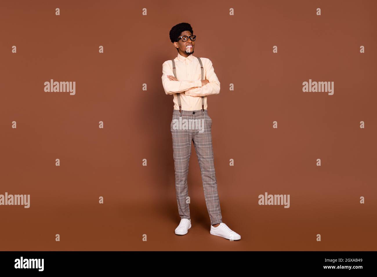 Full length body size view of attractive cheerful funky guy folded arms ...