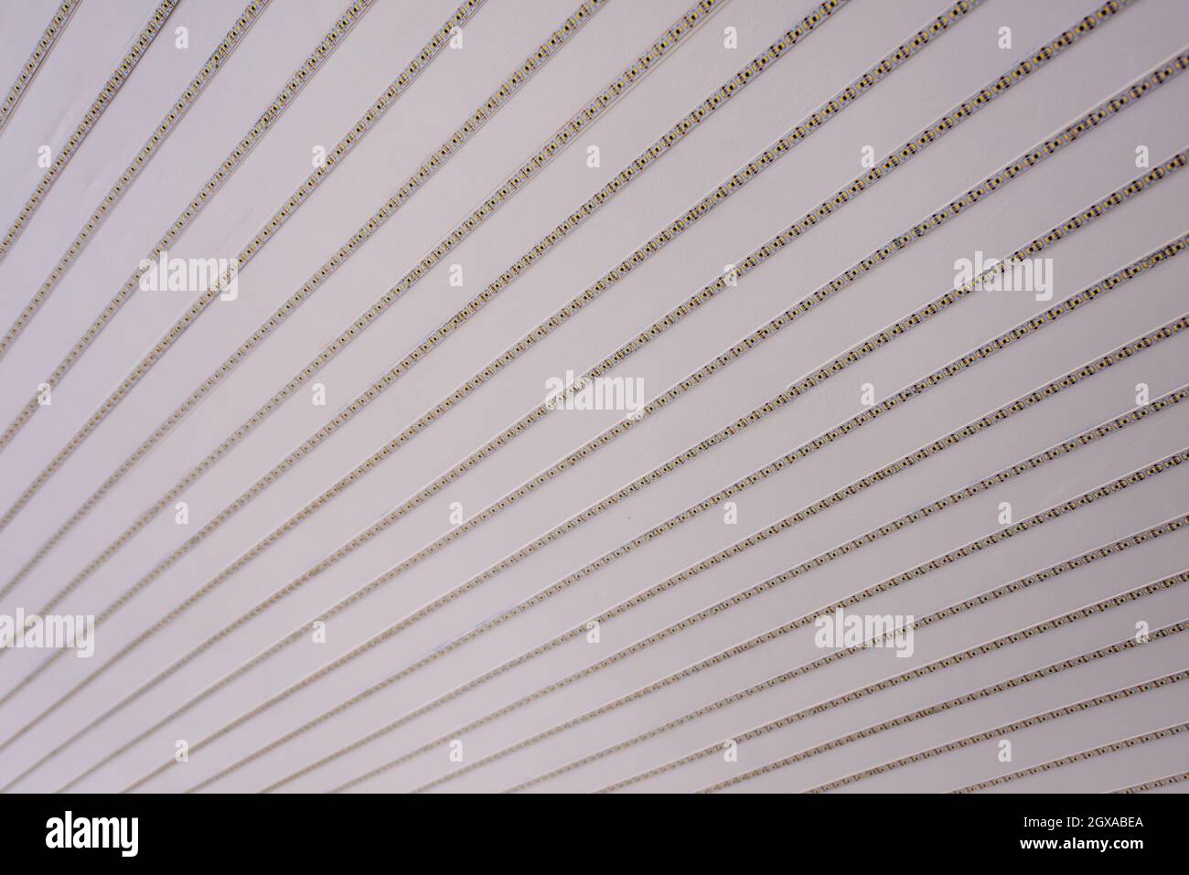 Diode strip.close up of led lights tape set on the ceiling at new ...