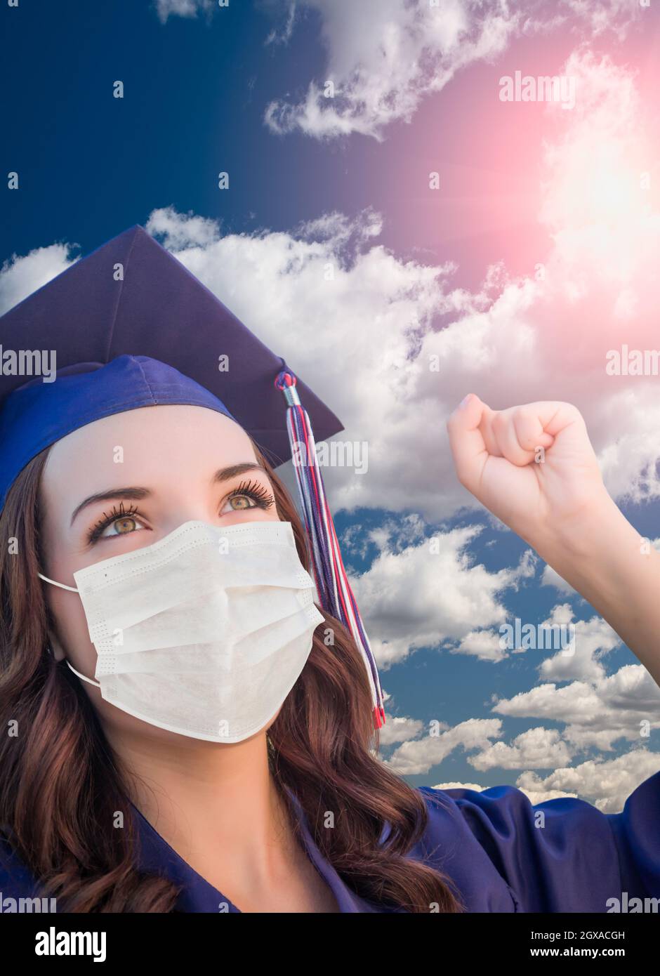 Female Graduate in Cap and Gown Wearing Medical Face Mask Stock Photo ...