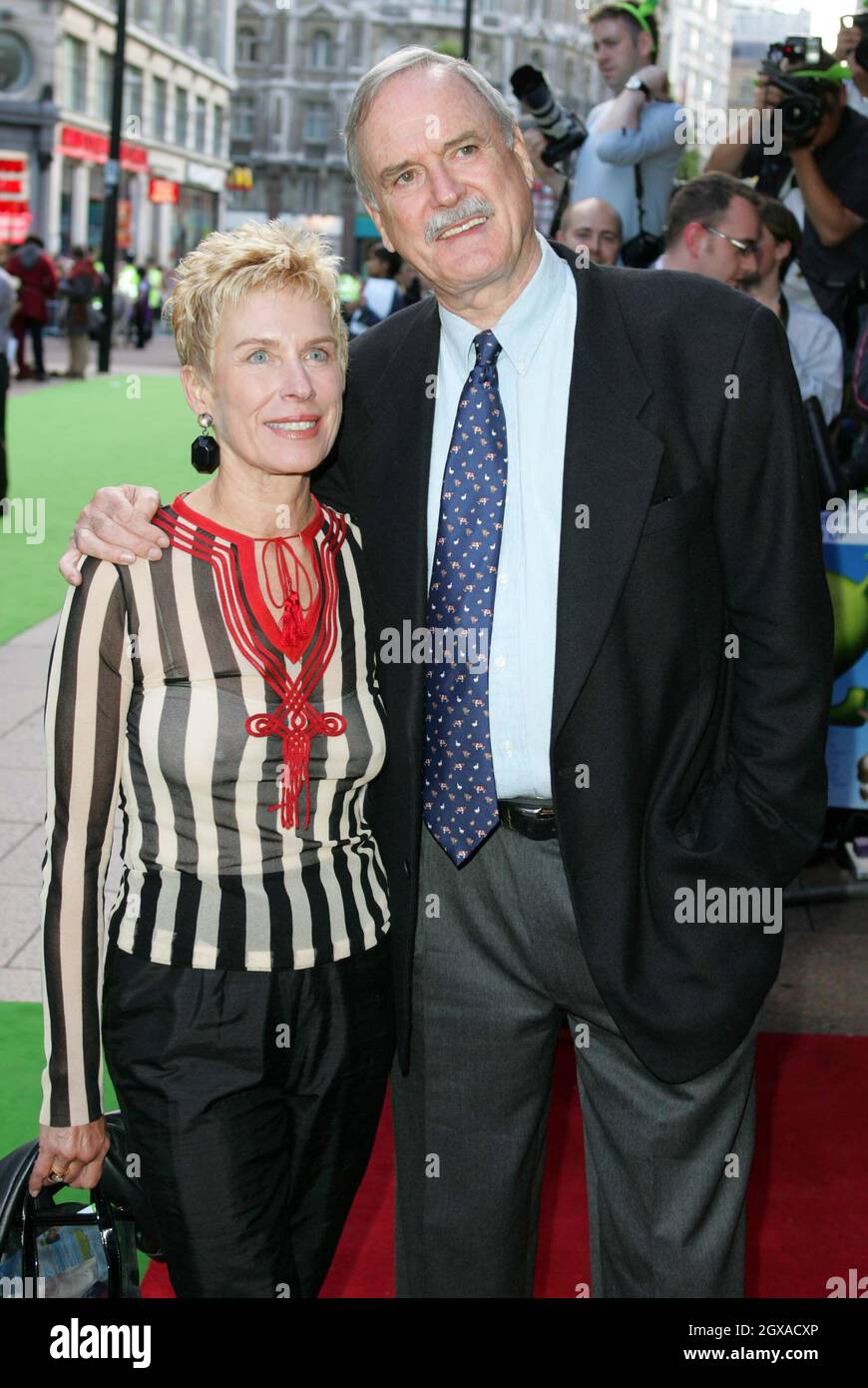 John Cleese and Alyce Faye attending the premiere of Shrek 2, in London ...