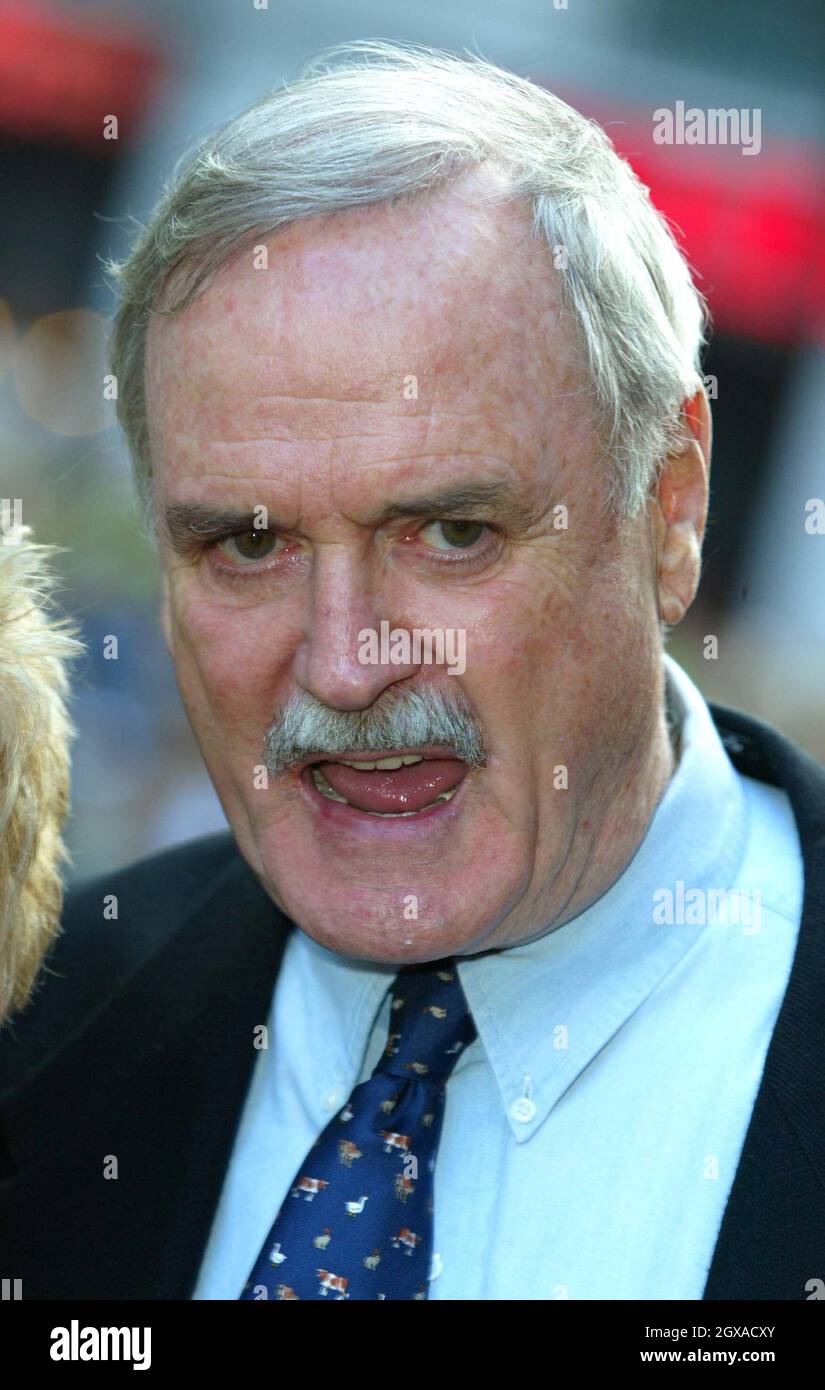 John Cleese attending the premiere of Shrek 2, in London's Leicester ...