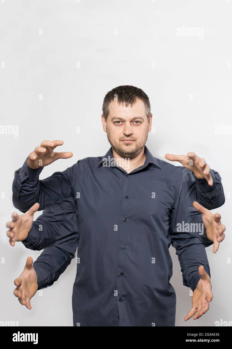 A Caucasian young man with six arms on a white background Stock Photo ...