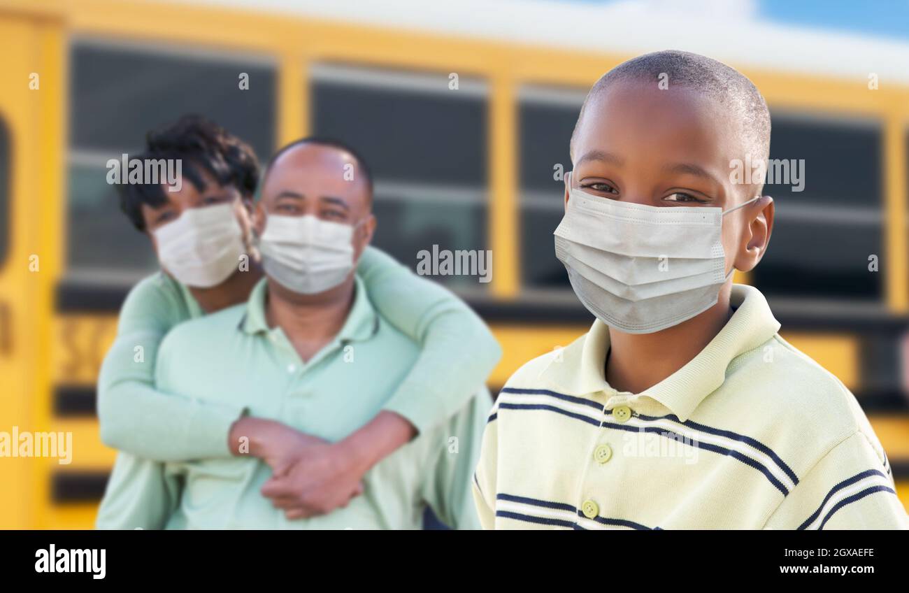 Young African American Student and Parents Near School Bus Wearing ...