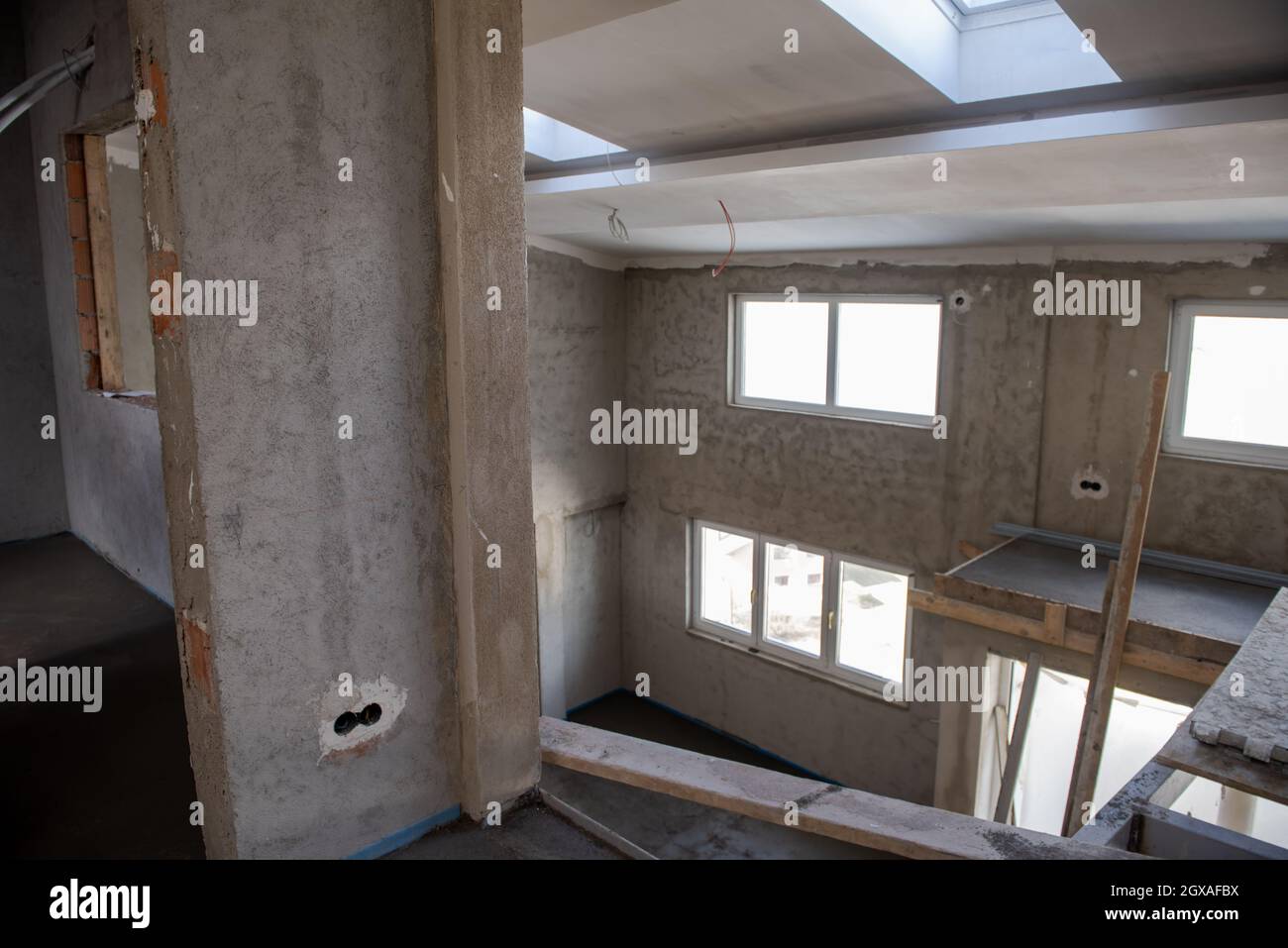interior of construction site with concrete walls at new unfinished ...